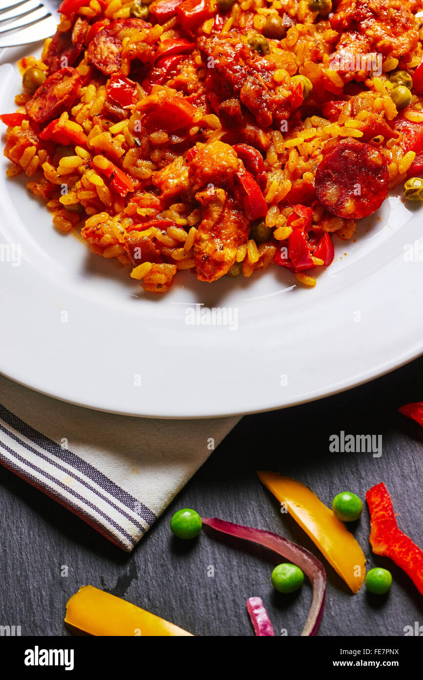 Paella dish on a plate served to eat Stock Photo - Alamy