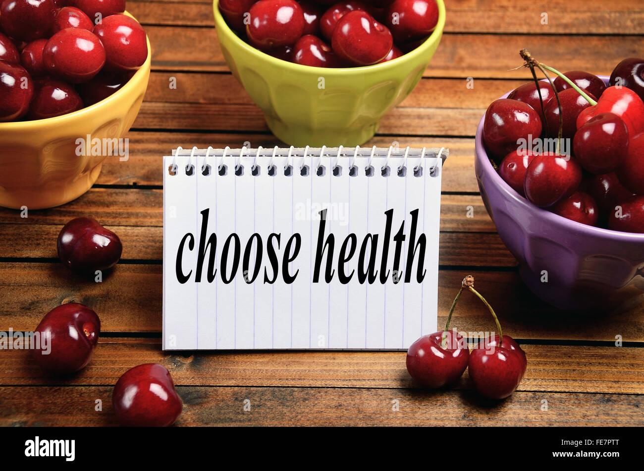 Choose health word on notebook Stock Photo - Alamy