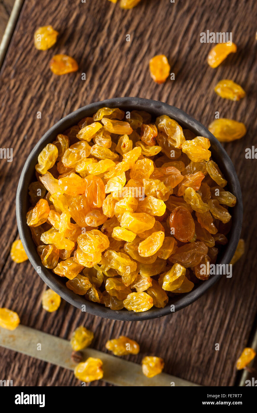 Organic Dried Golden Raisins in a Bowl Stock Photo - Alamy