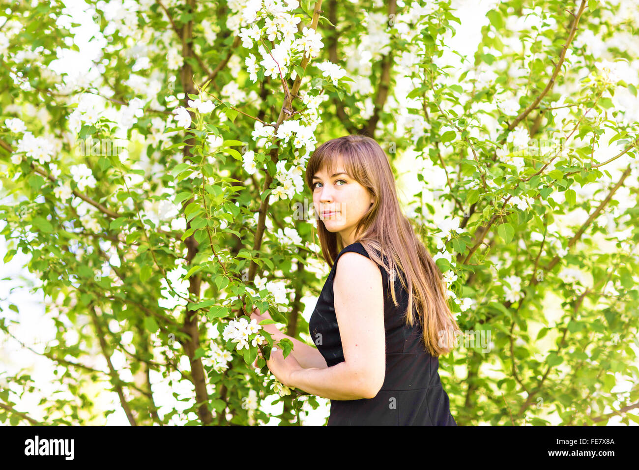 Beautiful Spring Girl with flowers Stock Photo - Alamy