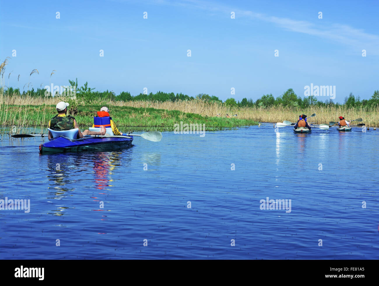 Spring river travel of school students group on canoes - may 2011 Stock ...
