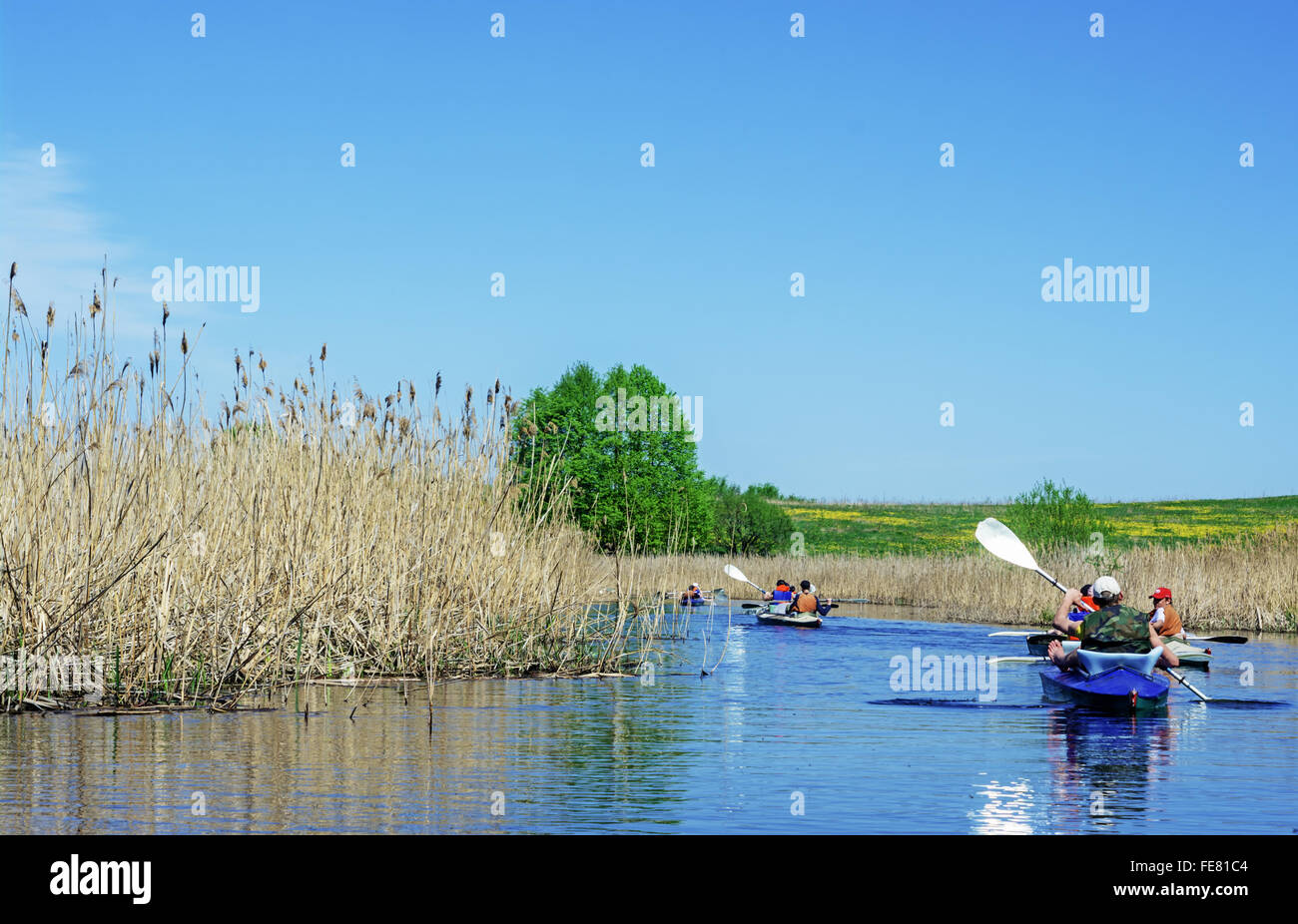 Spring river travel of school students group on canoes - may 2011 Stock ...