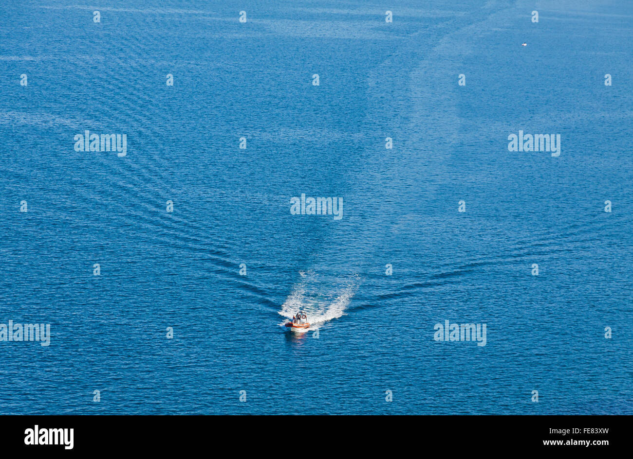 Small speedboat floating on the water. Gulf of Naples, Italy Stock ...