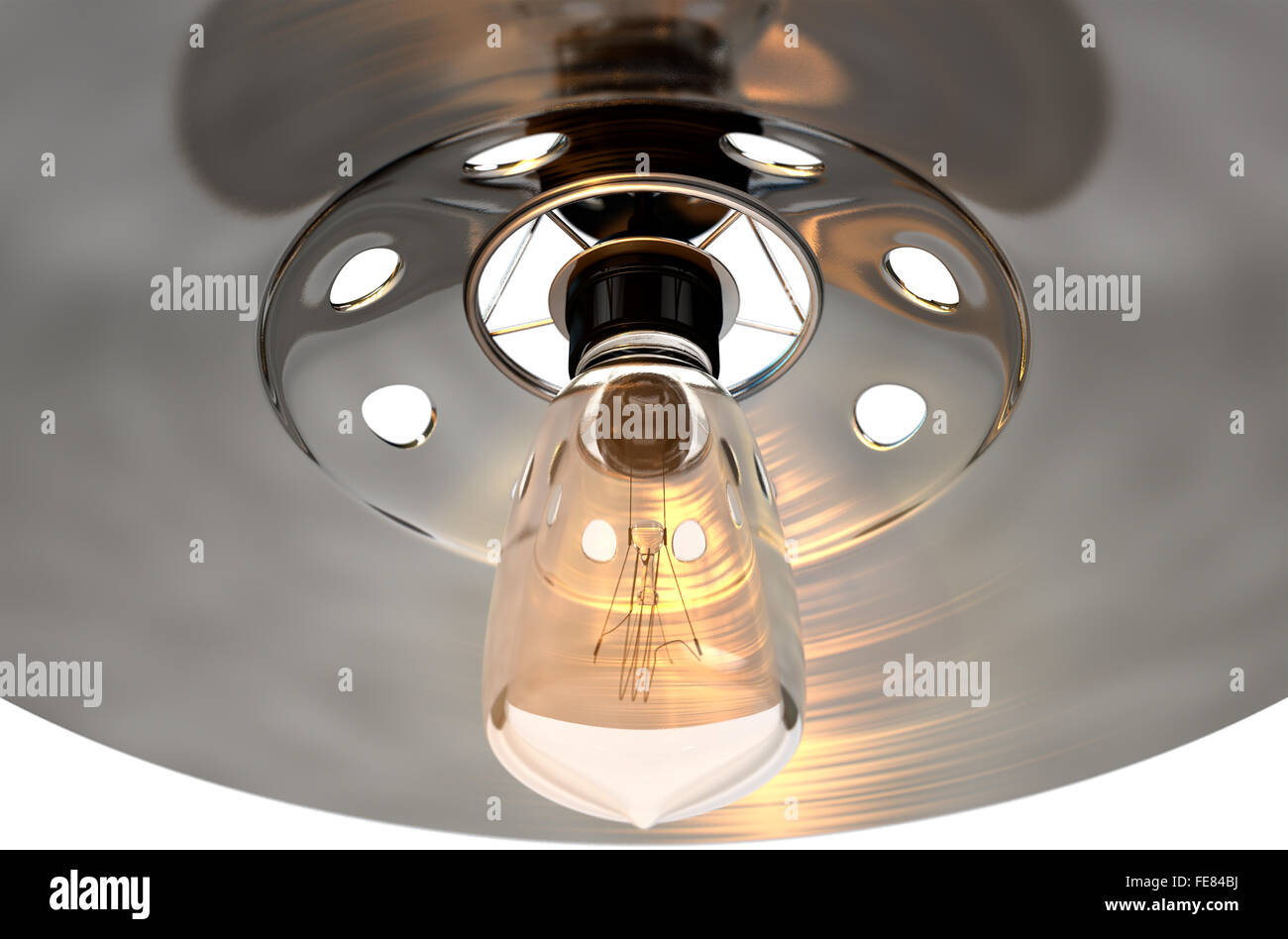 A retro light fitting with a lamp shade and a bulb on an isolated white ...
