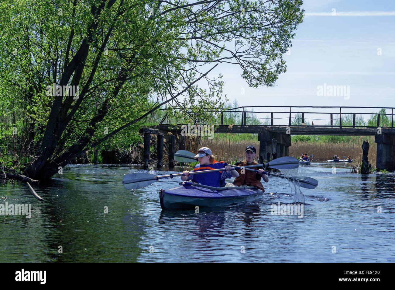 Spring river travel of school students group on canoes - may 2011 Stock ...