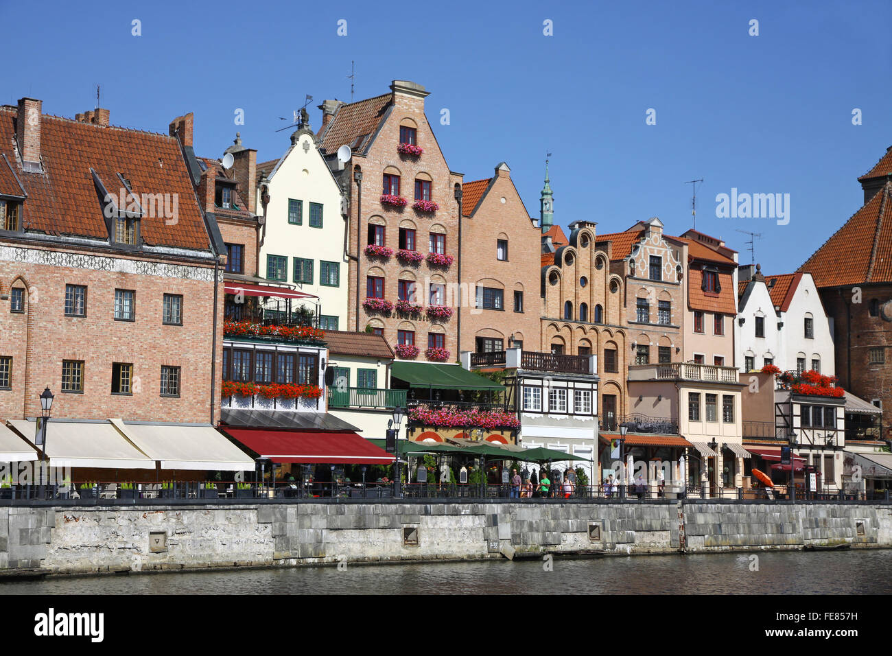 Colourful old buildings with blue sky background at Długie Pobrzeże ...