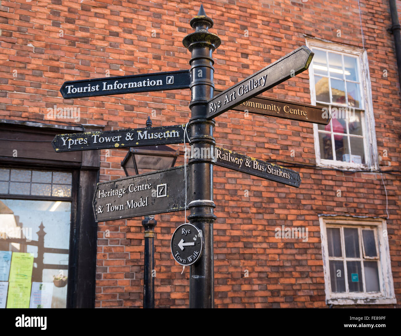 Signpost on the High Street Rye, East Sussex, directing tourists to the ...