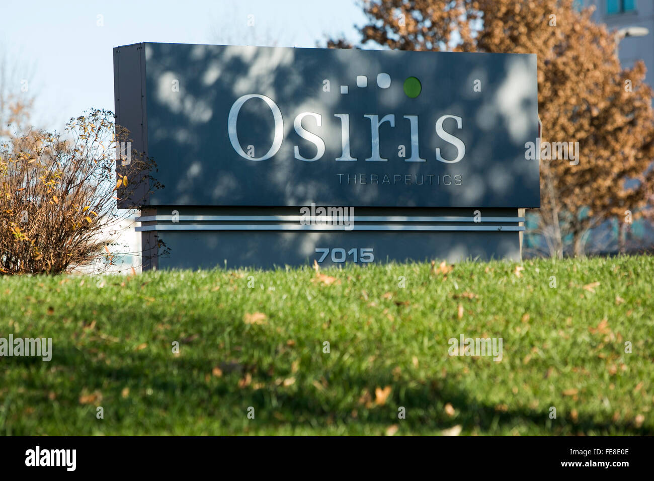 A logo sign outside of the headquarters of Osiris Therapeutics, Inc ...