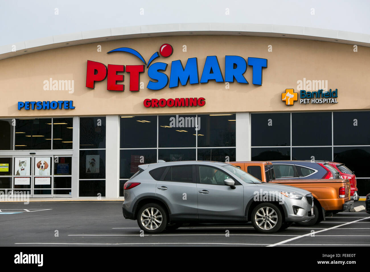 A logo sign outside of a PetSmart, Inc., retail store in Tysons ...