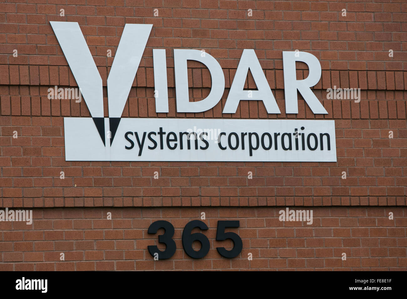 A logo sign outside of an office building occupied by Vidar Systems in ...