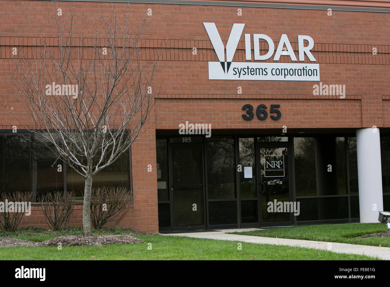 A logo sign outside of an office building occupied by Vidar Systems in Herndon, Virginia on ...