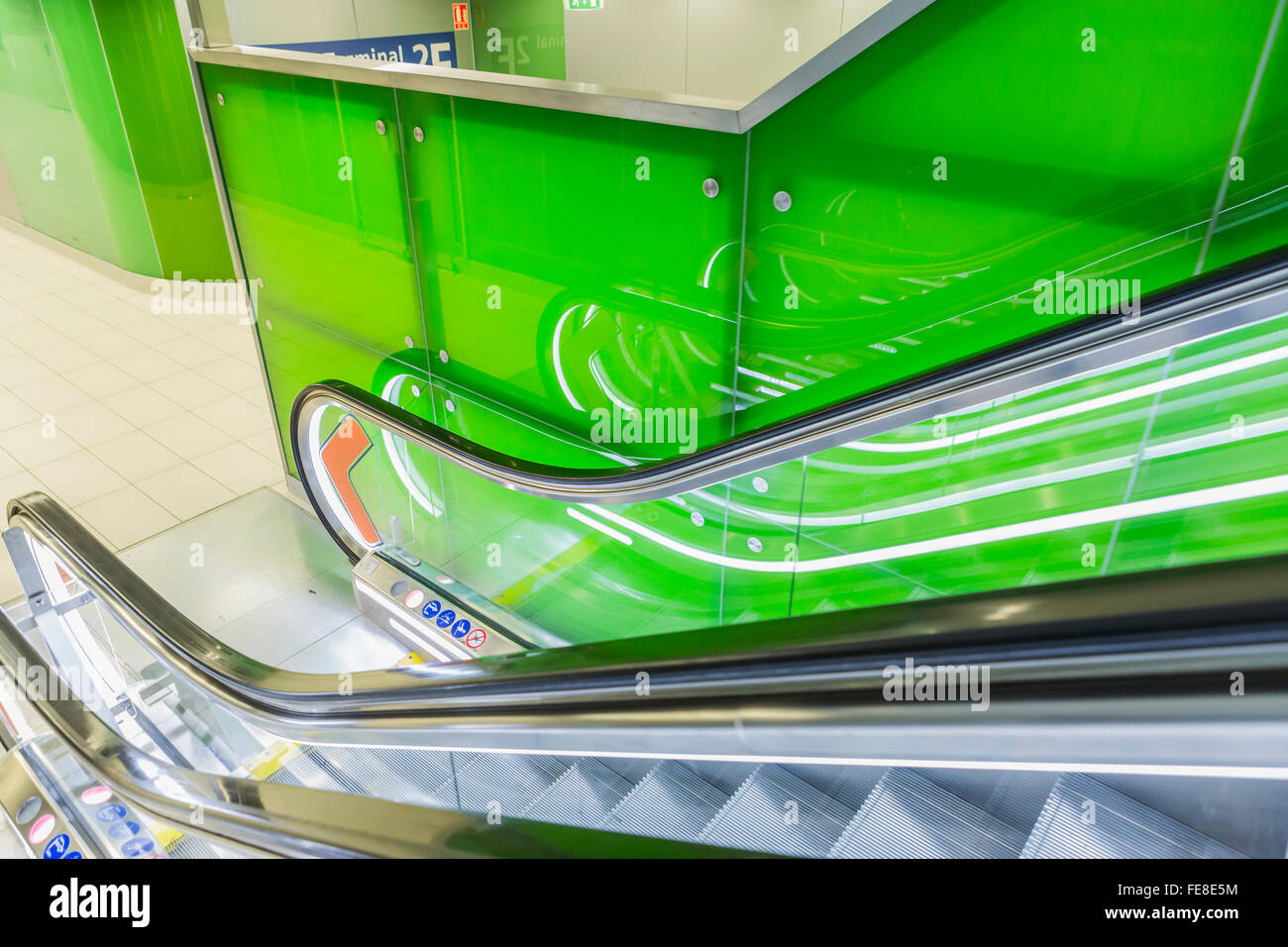 Perspective wide angle of escalators, green color combination ...