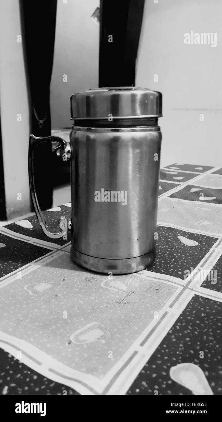 Steel Jug On Table Stock Photo - Alamy