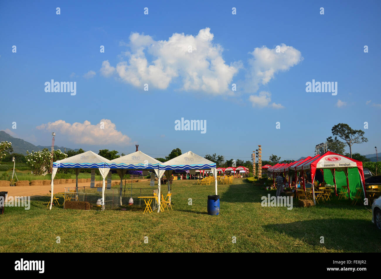 Thai merchant prepare and setting shop for sale traveller at market ...