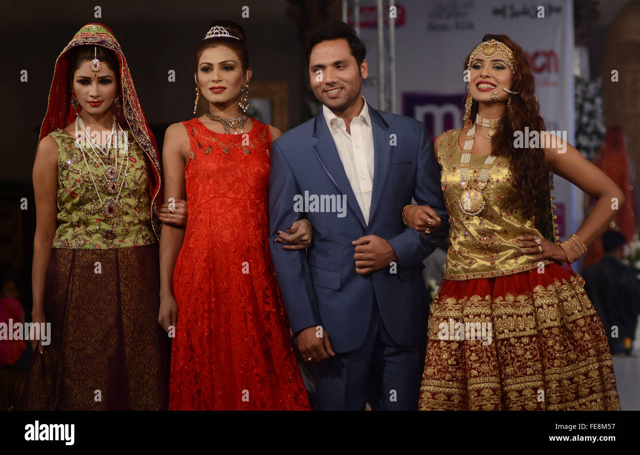 Lahore, Pakistan. 04th Feb, 2016. Pakistani models present the creation ...