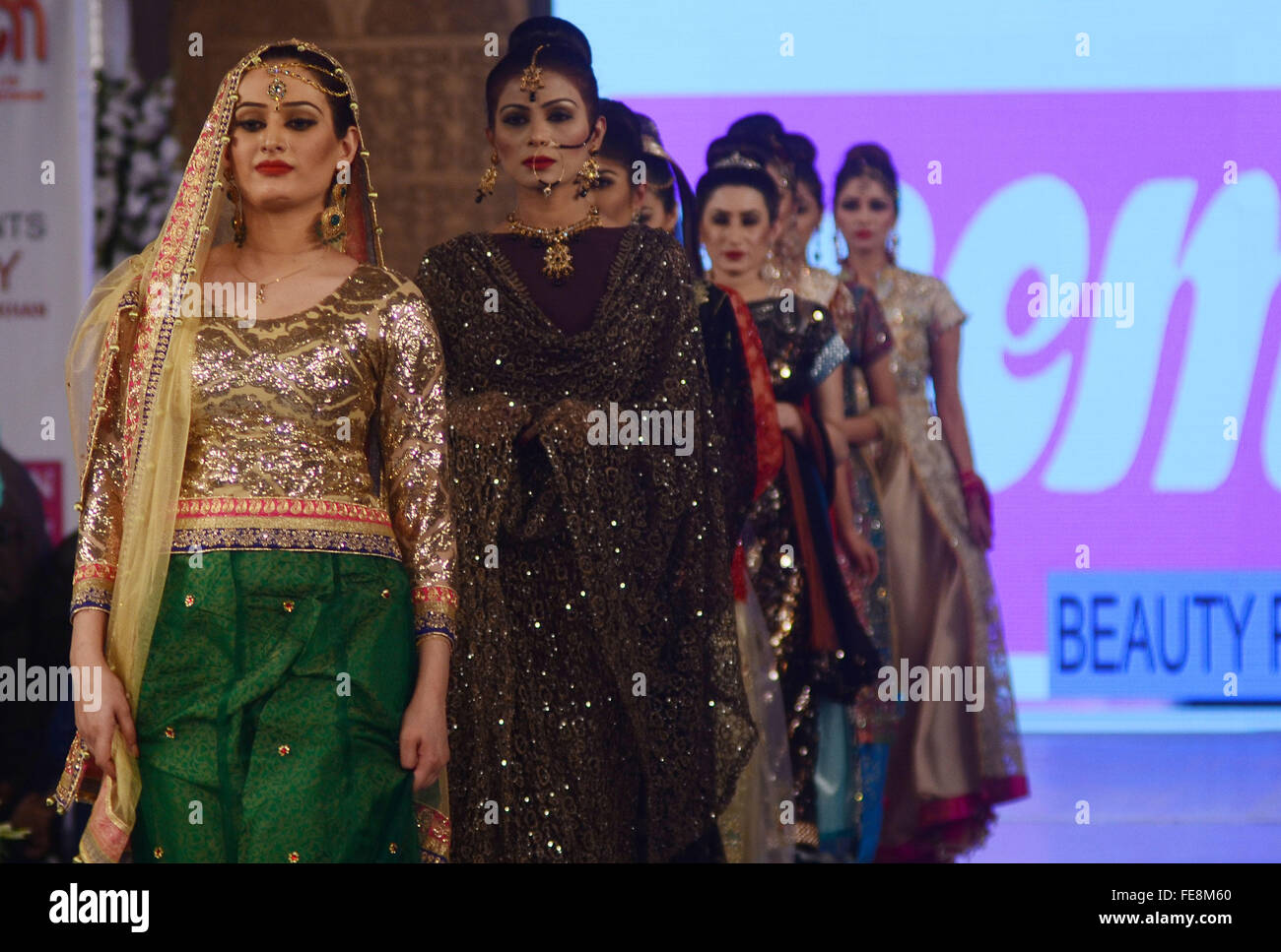 Lahore, Pakistan. 04th Feb, 2016. Pakistani models present the creation ...