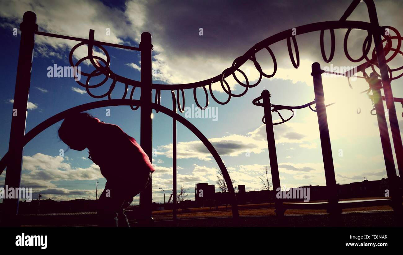 Girl Playing In Playground Stock Photo - Alamy