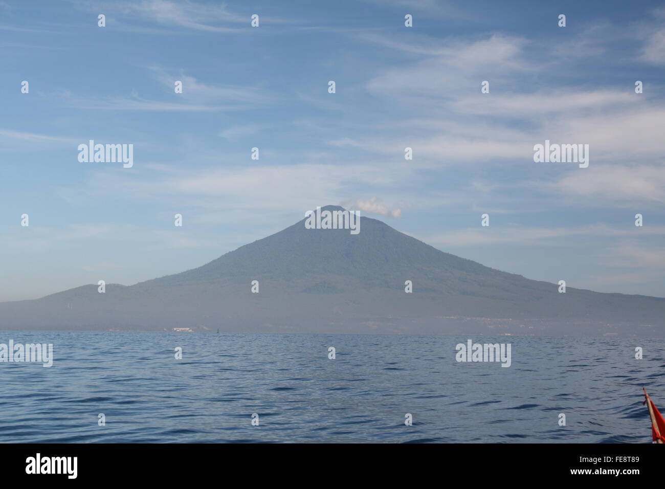 Cloudy Sky Above Volcano In Sea Stock Photo - Alamy