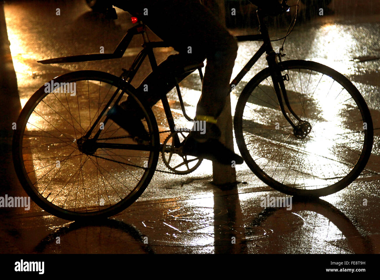 Rain riding hi-res stock photography and images - Alamy