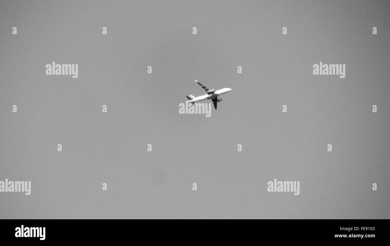 Low Angle View Of Airplane In Clear Sky Stock Photo - Alamy