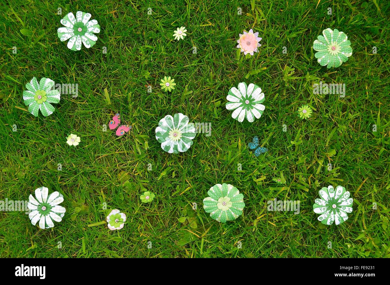 Paper flowers butterflies on grass hi-res stock photography and images ...