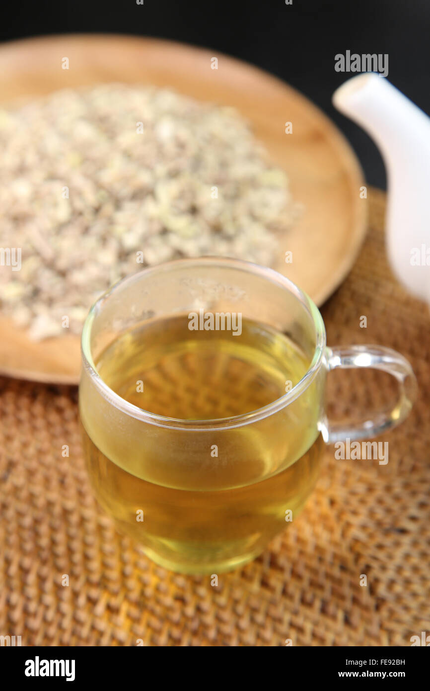 A cup of healthy tea and tea leaves Stock Photo - Alamy