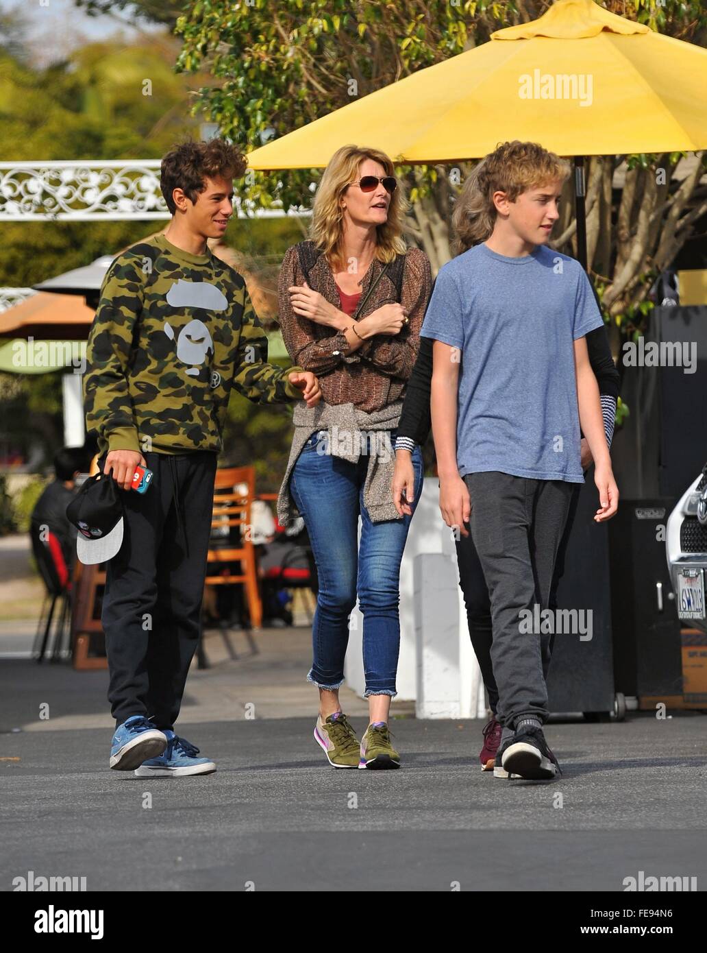 Laura Dern having lunch with a family. Featuring: Laura Dern, Ellery ...