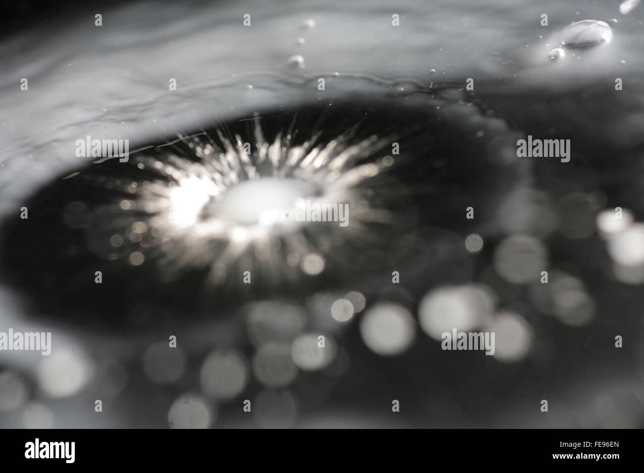 Smal drop of milk splashing Stock Photo - Alamy