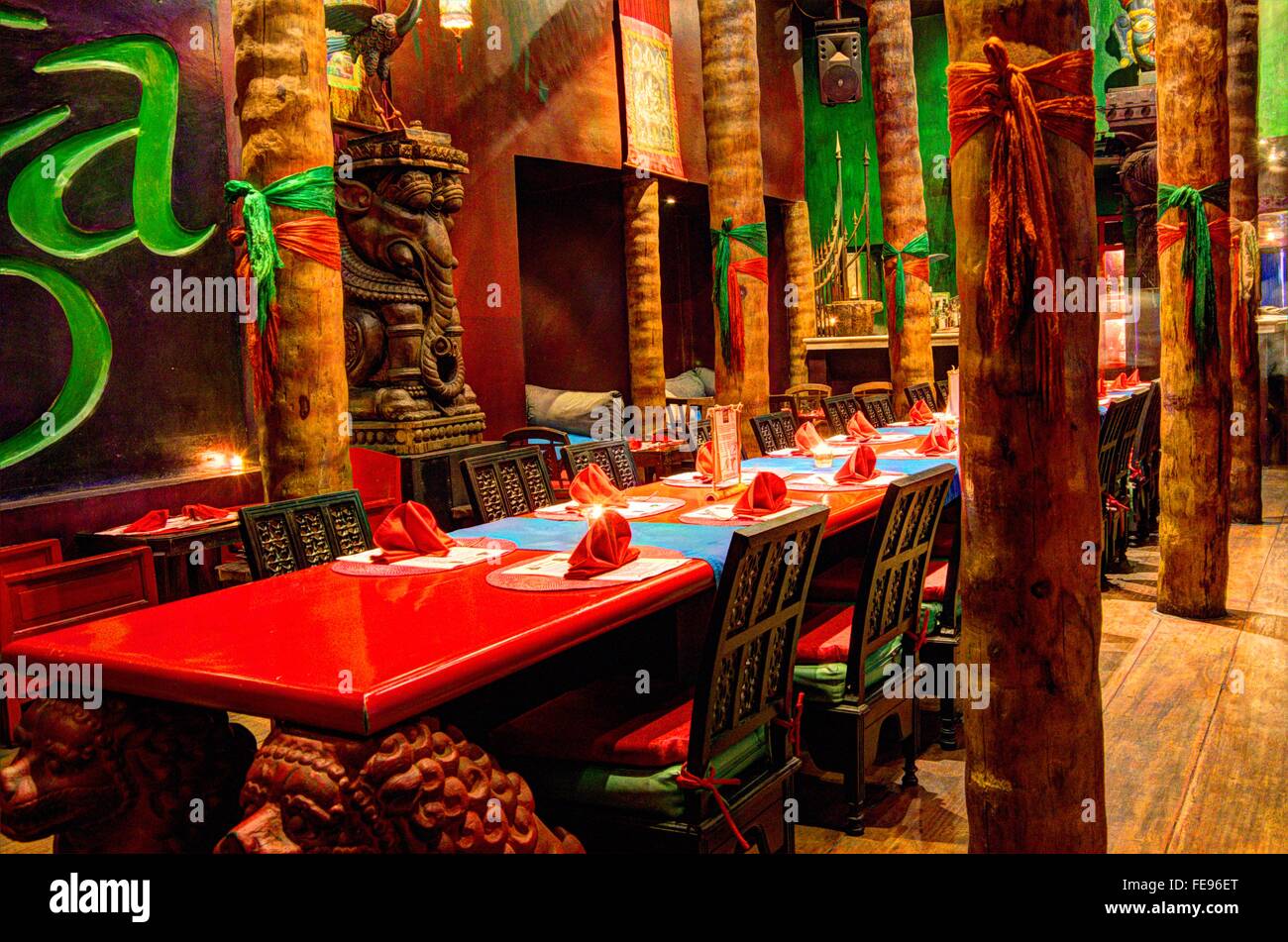 Exotic, rustic Asian themed dining room Stock Photo - Alamy
