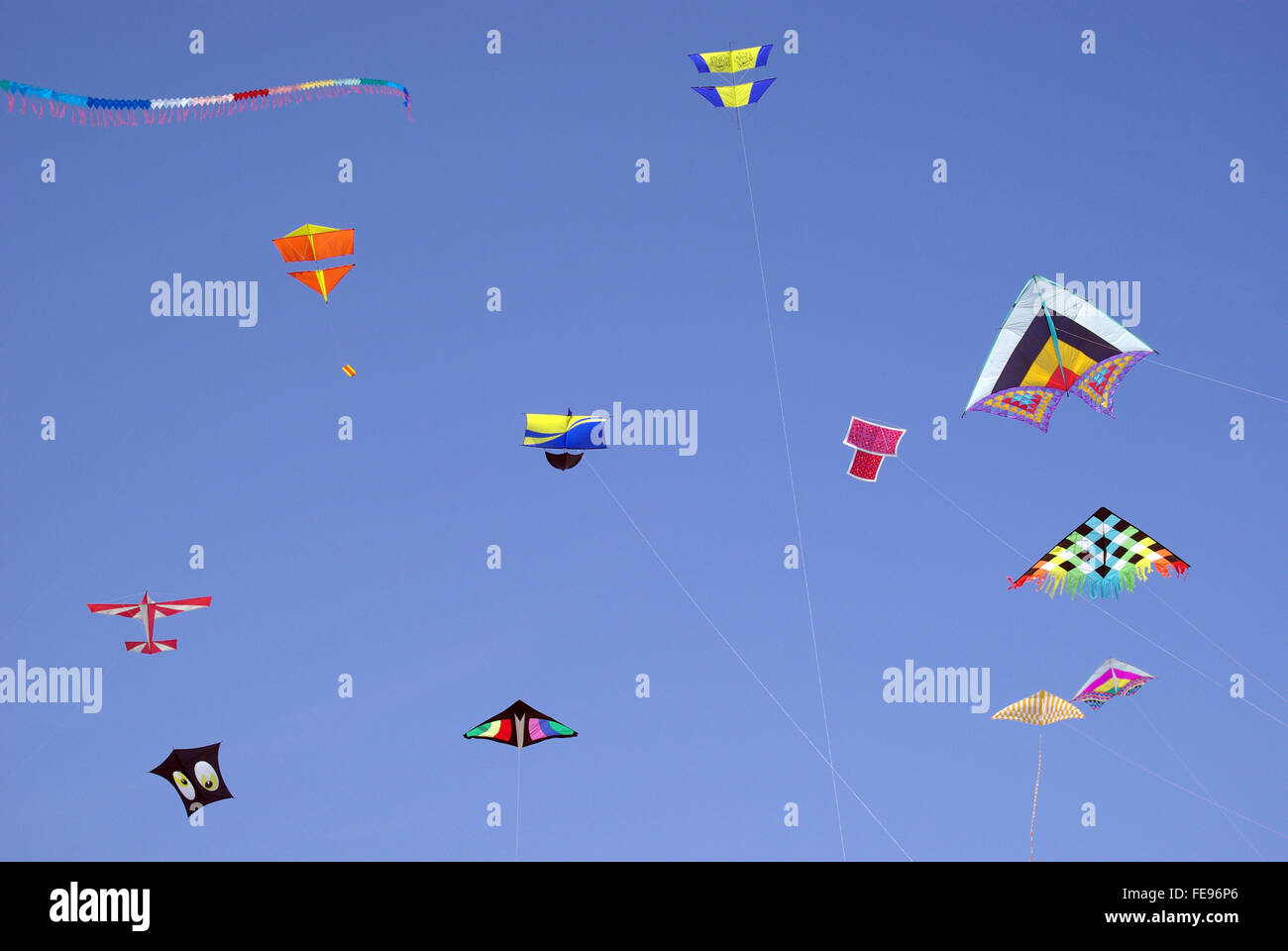 Colorful kites in sky Stock Photo - Alamy