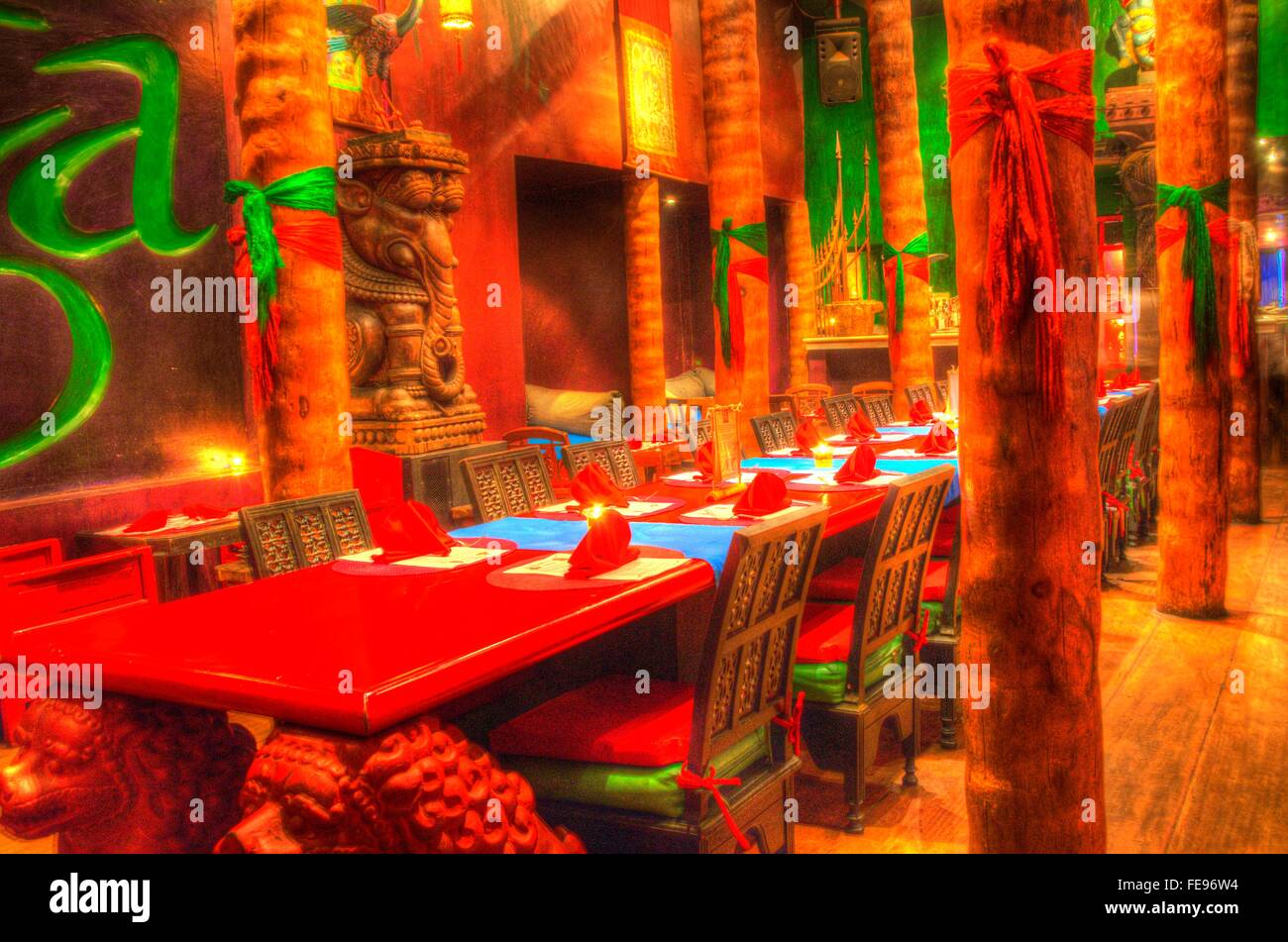 Exotic, rustic Asian themed dining room Stock Photo - Alamy