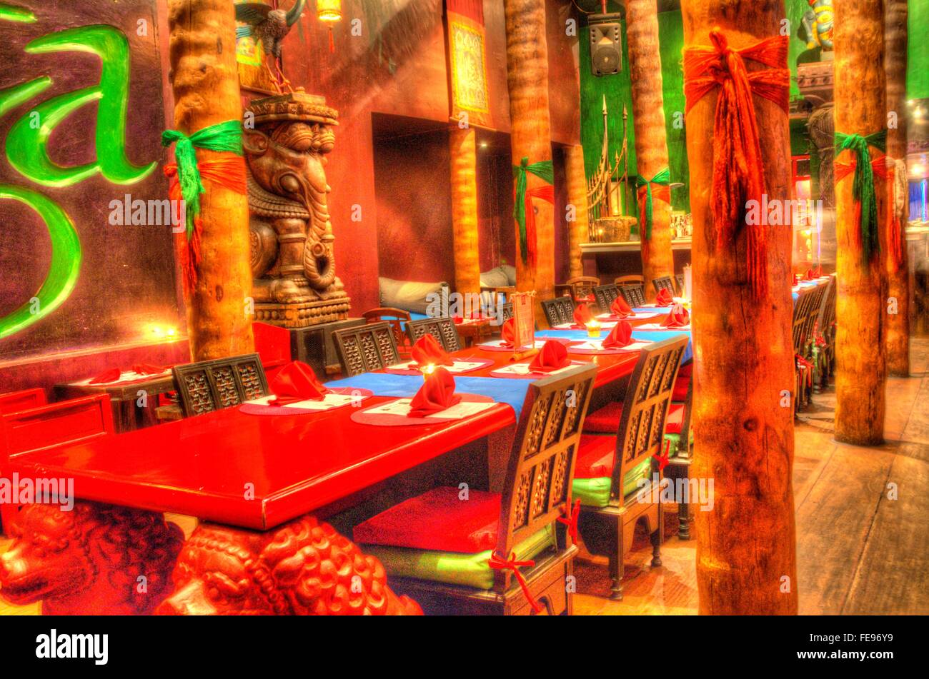 Exotic, rustic Asian themed dining room Stock Photo - Alamy