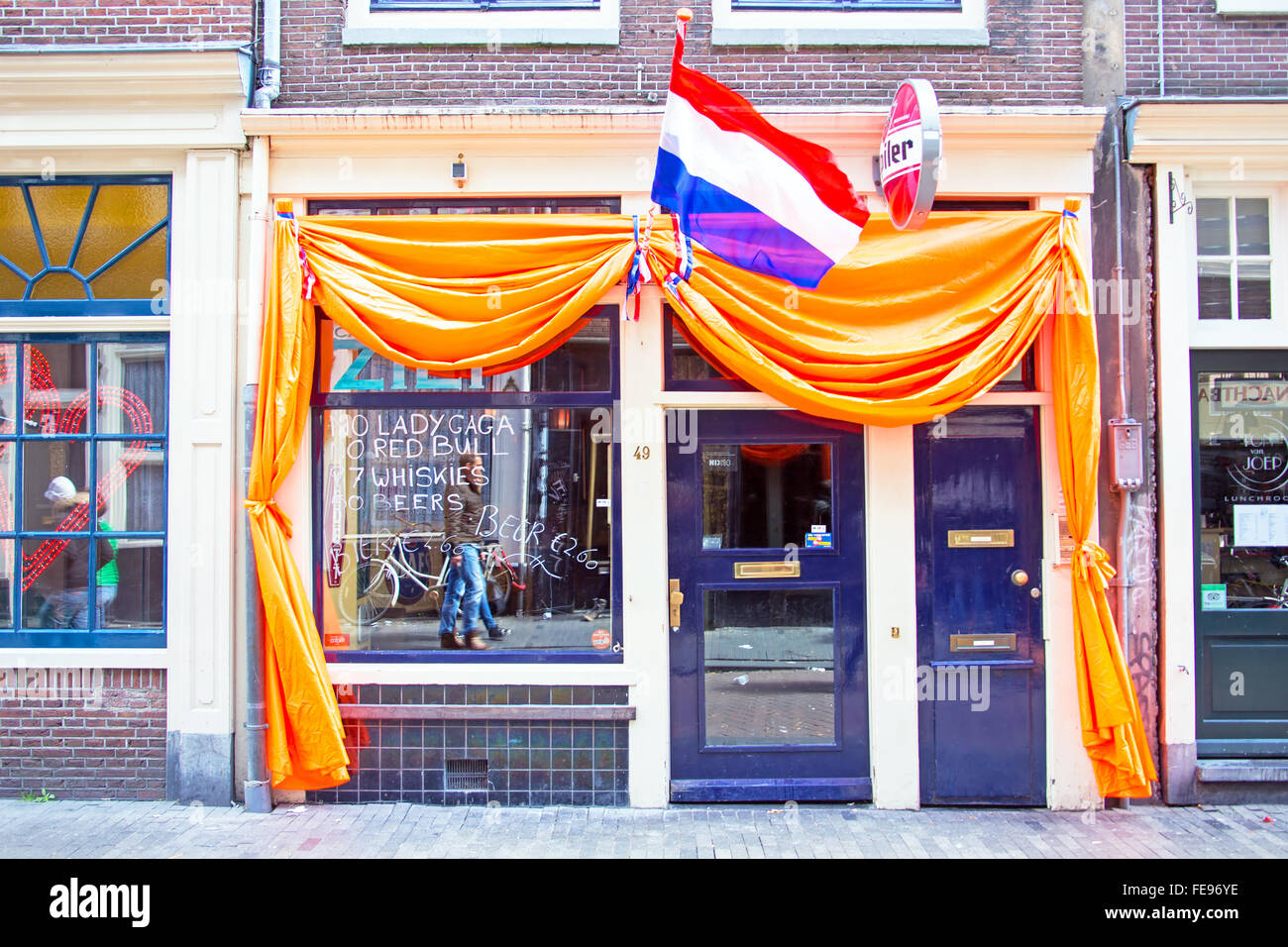 AMSTERDAM - APR 27: Decorated dutch cafe in Amsterdam at Kings Day on ...