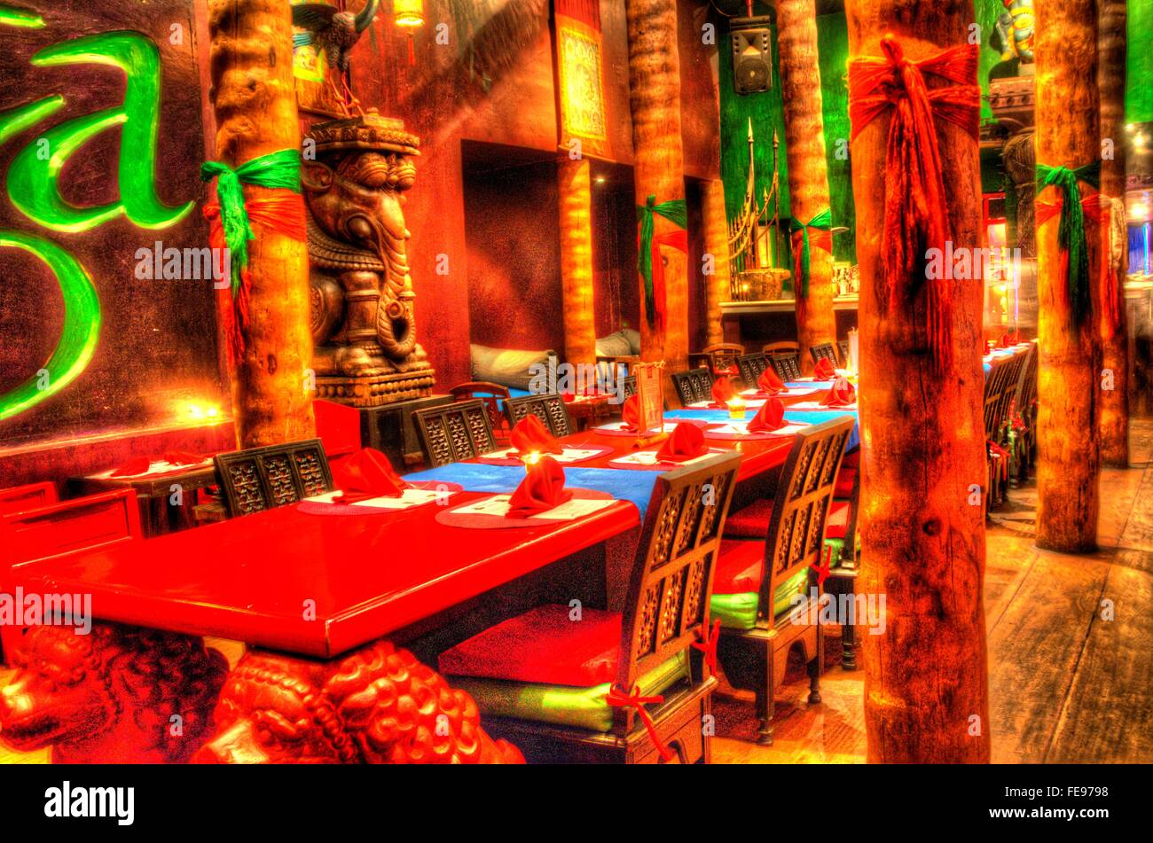 Exotic, rustic Asian themed dining room Stock Photo - Alamy