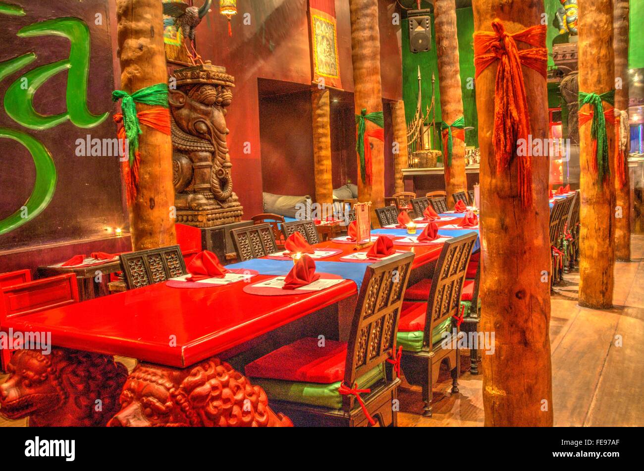Exotic, rustic Asian themed dining room Stock Photo - Alamy