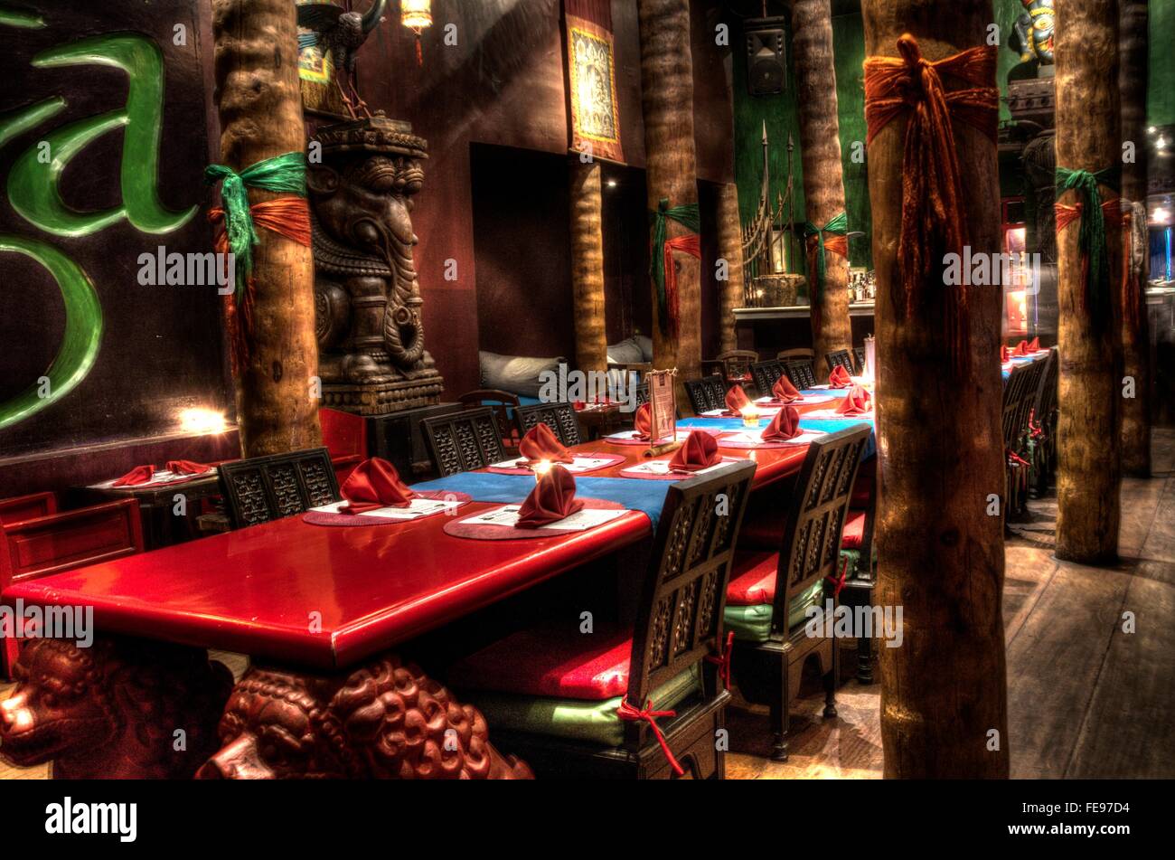 Exotic, rustic Asian themed dining room Stock Photo - Alamy