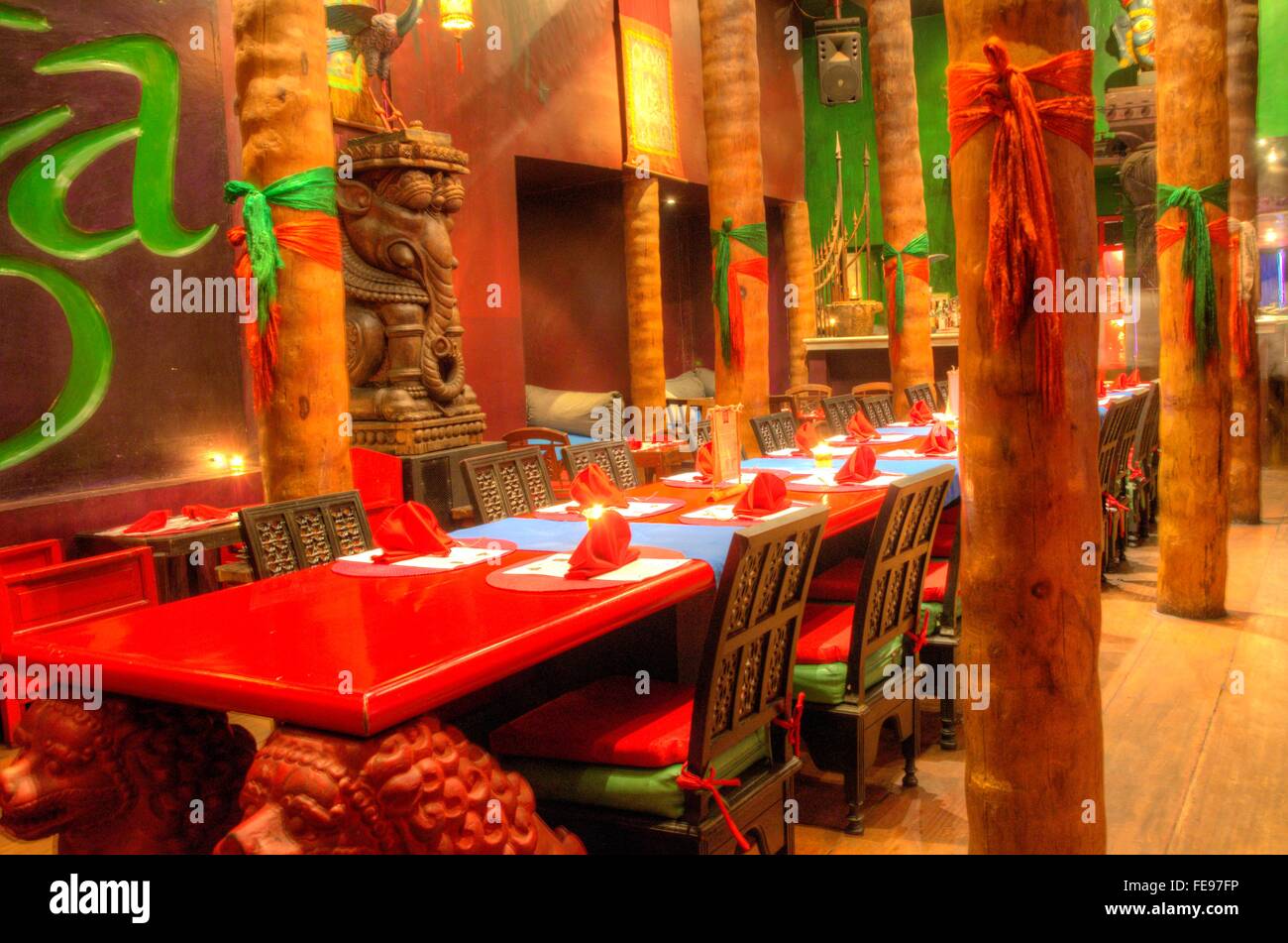 Exotic, rustic Asian themed dining room Stock Photo - Alamy