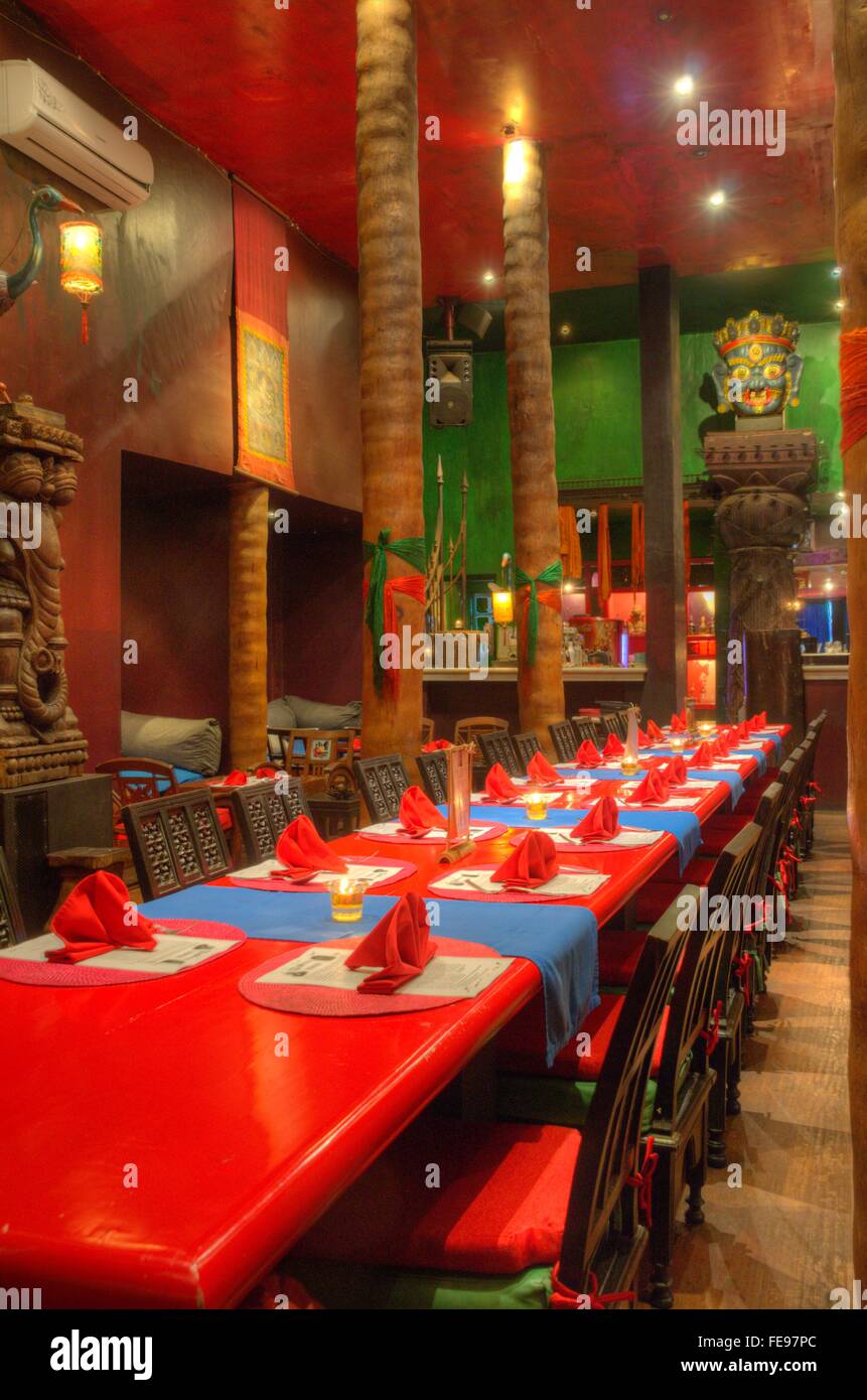 Exotic, rustic Asian themed dining room Stock Photo - Alamy