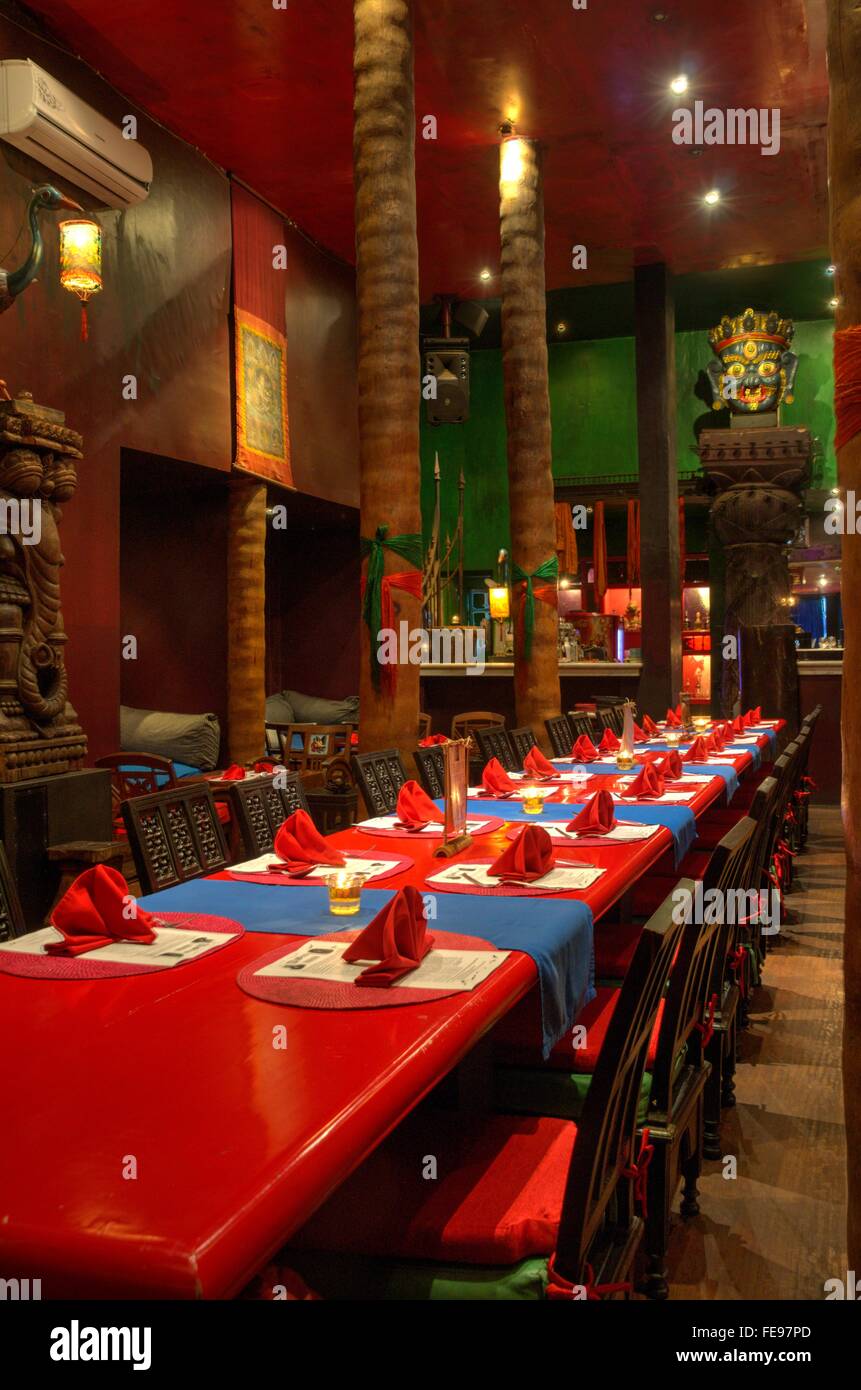 Exotic, rustic Asian themed dining room Stock Photo - Alamy
