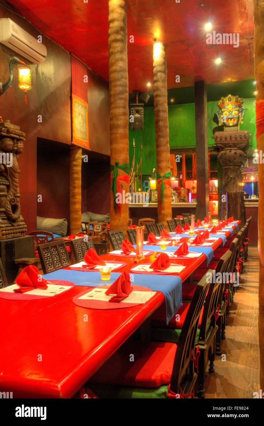 Exotic, rustic Asian themed dining room Stock Photo - Alamy