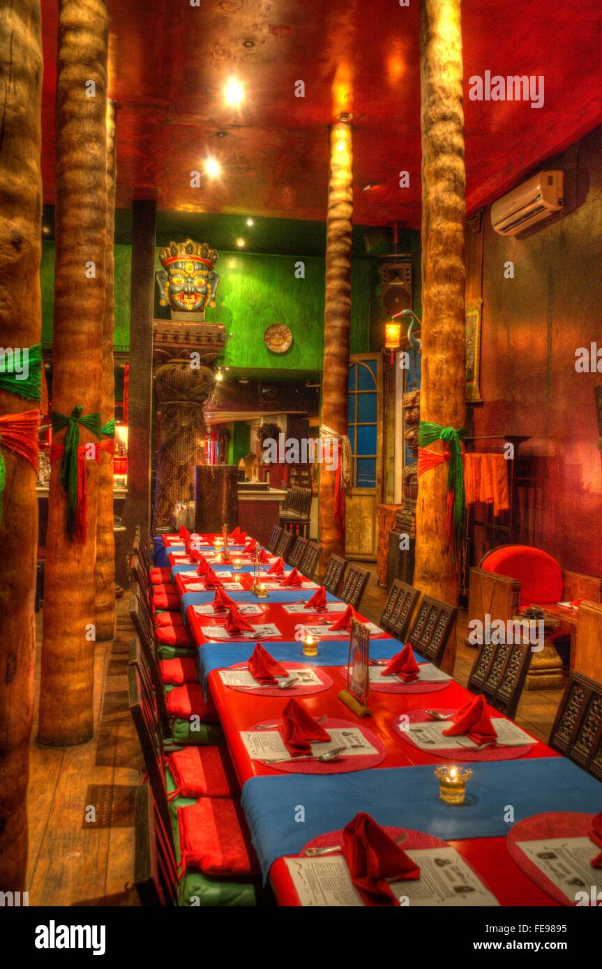 Exotic, rustic Asian themed dining room Stock Photo - Alamy