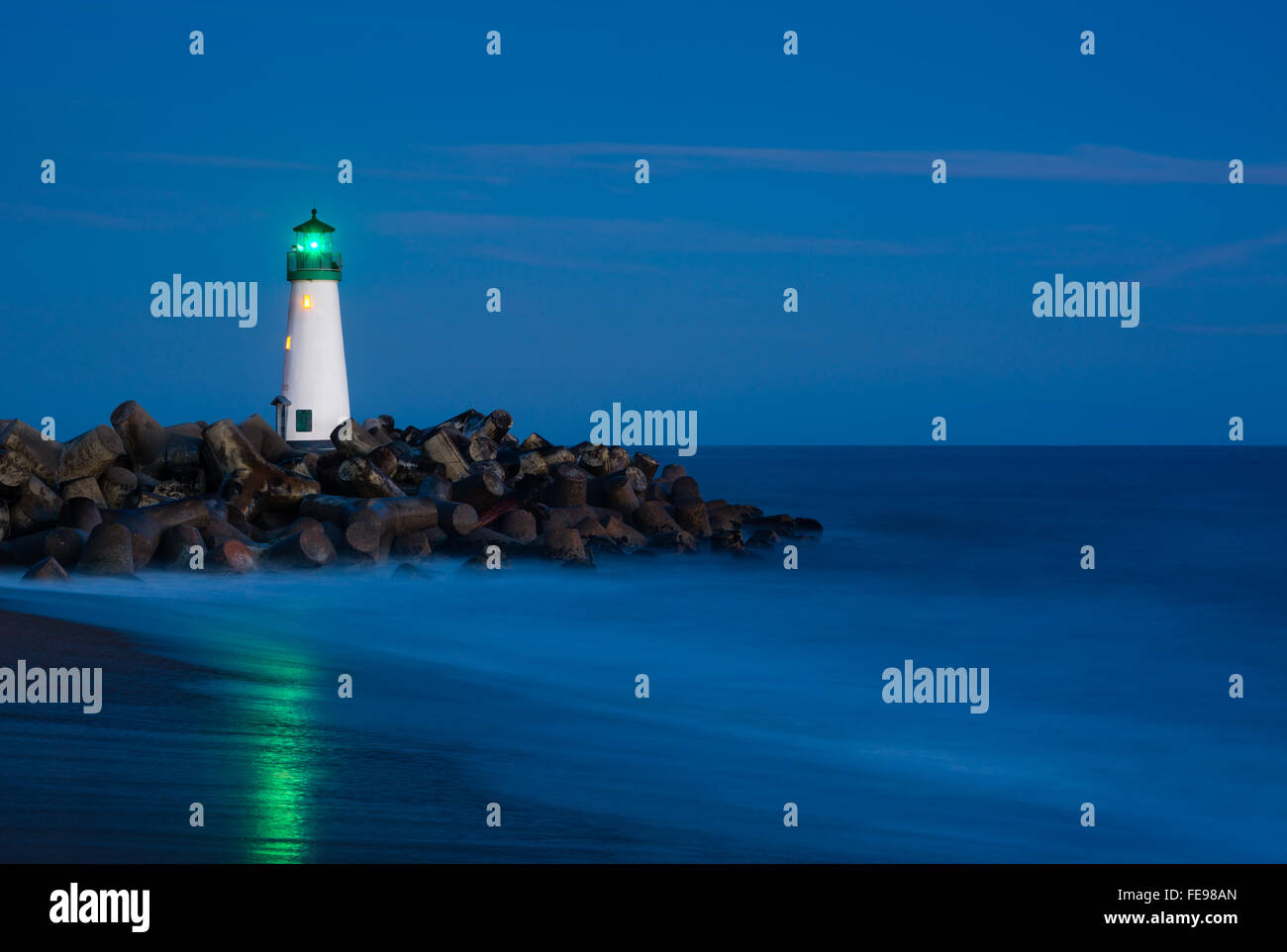 Santa Cruz Breakwater Lighthouse in Santa Cruz, California at night ...