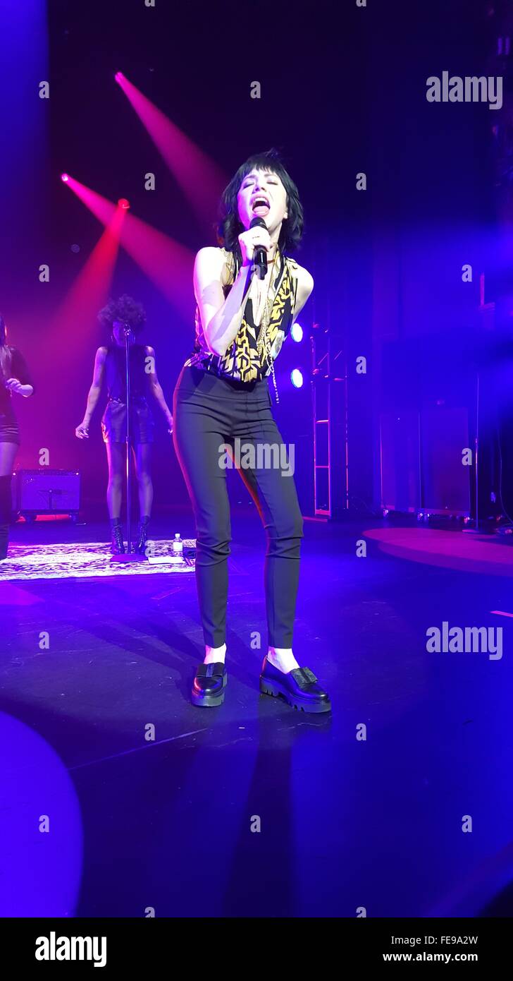 Carly Rae Jepsen performing live on stage as she sings out hits from ...