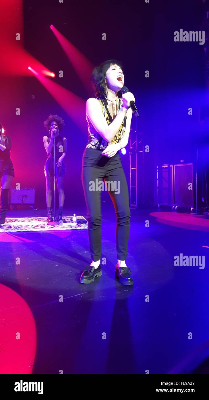 Carly Rae Jepsen performing live on stage as she sings out hits from ...