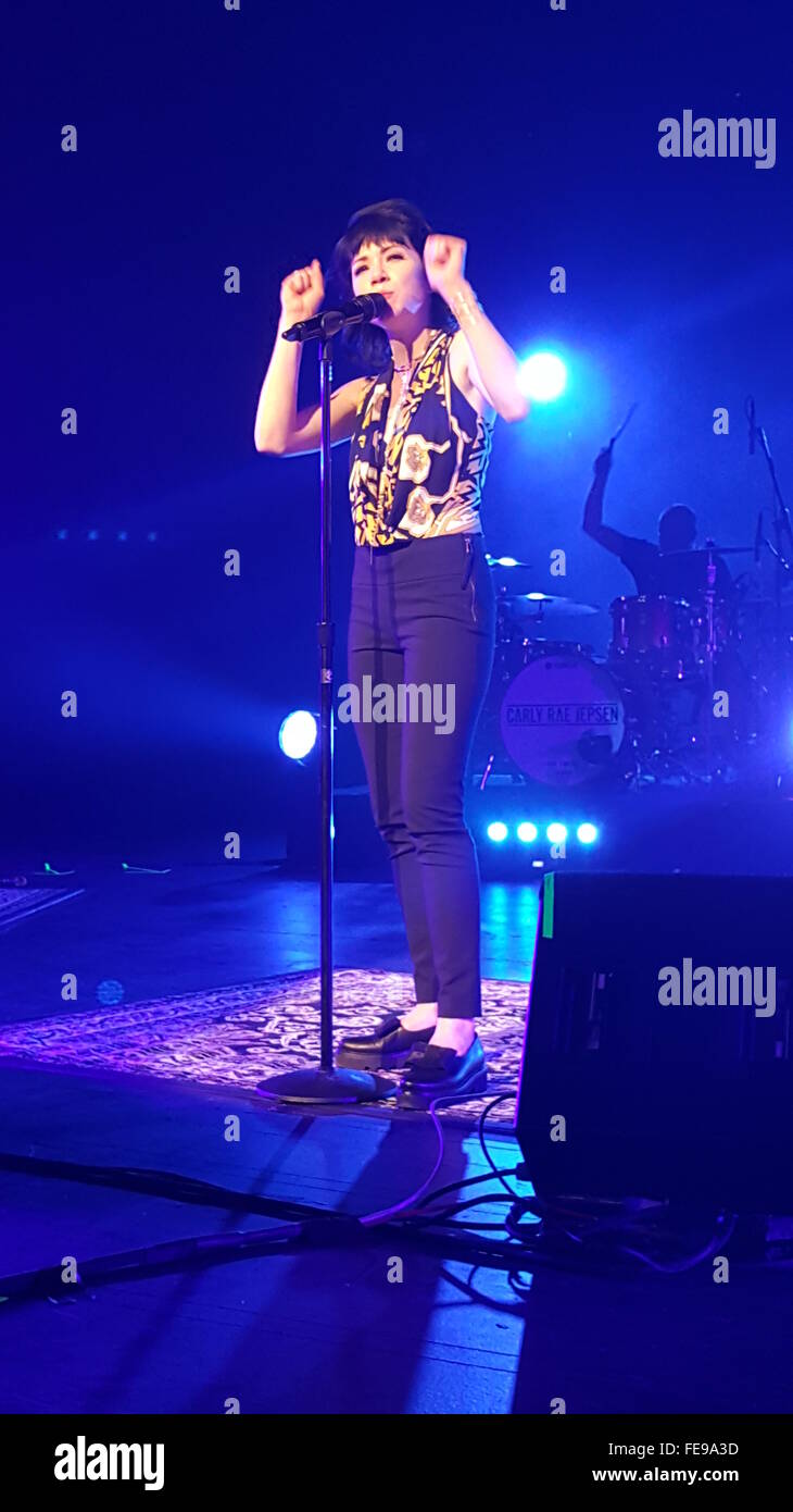 Carly Rae Jepsen performing live on stage as she sings out hits from ...