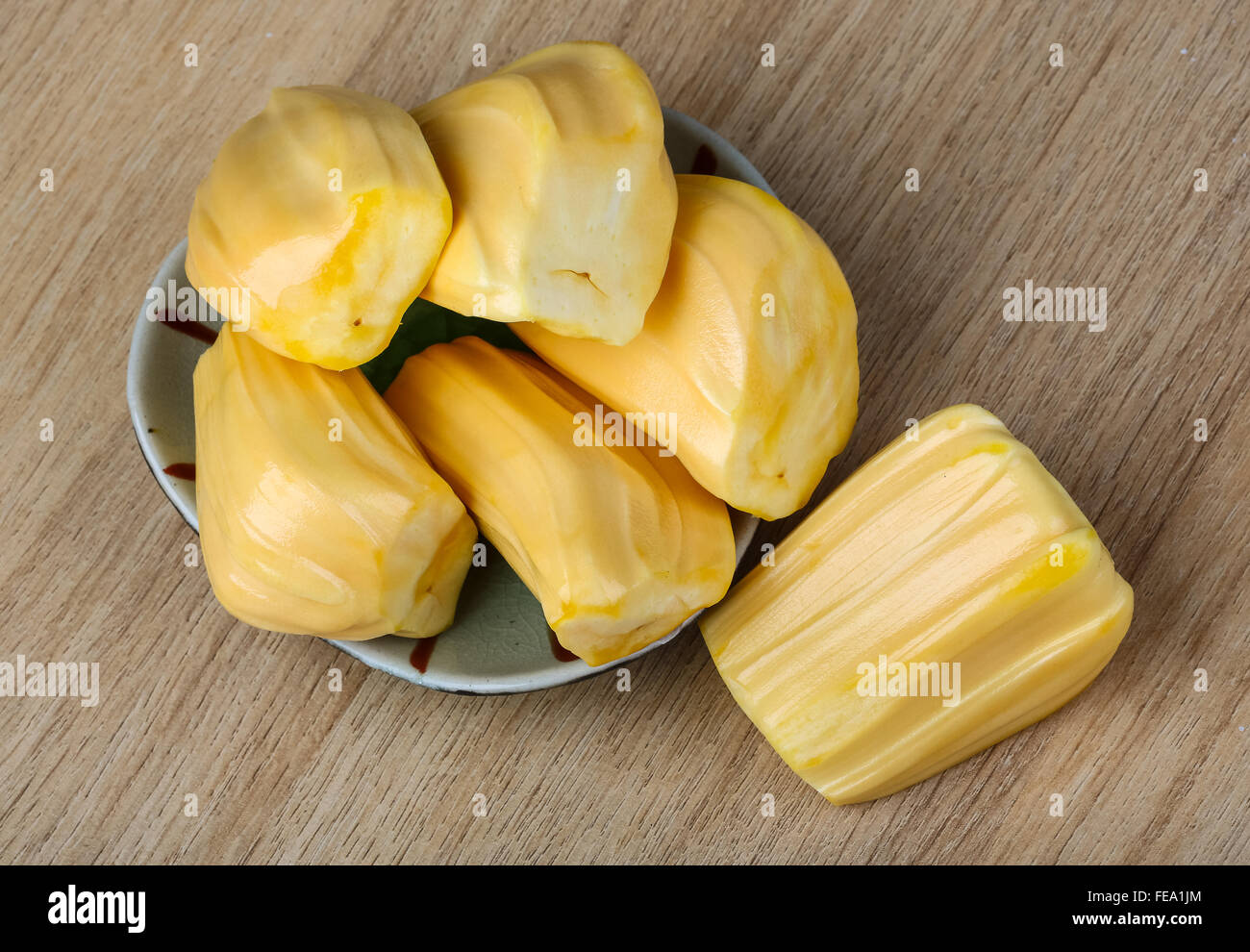 Tropical Jack Fruit on the wood background Stock Photo - Alamy