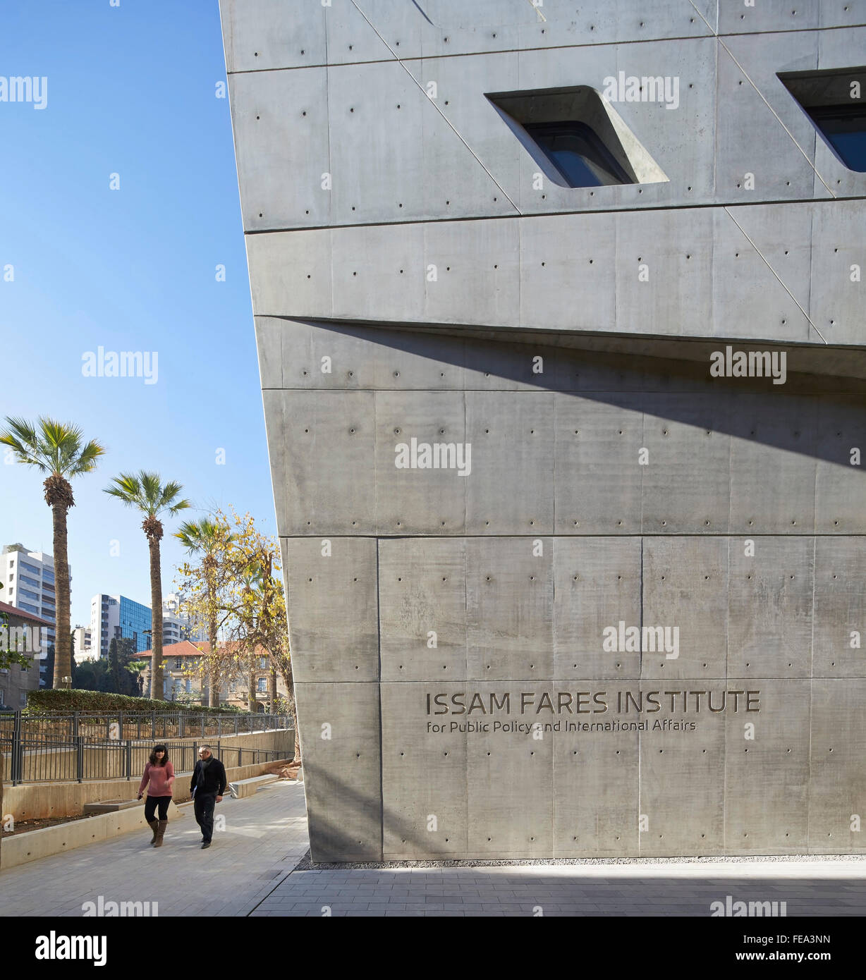 Concrete entrance facade with signage. Issam Fares Institute, Beirut ...