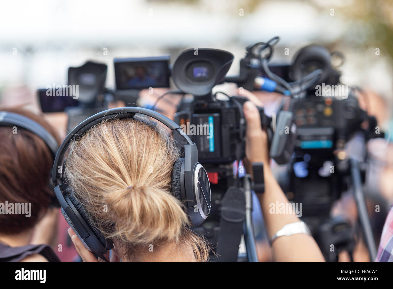 Press conference. Covering an media event with a video camera Stock ...
