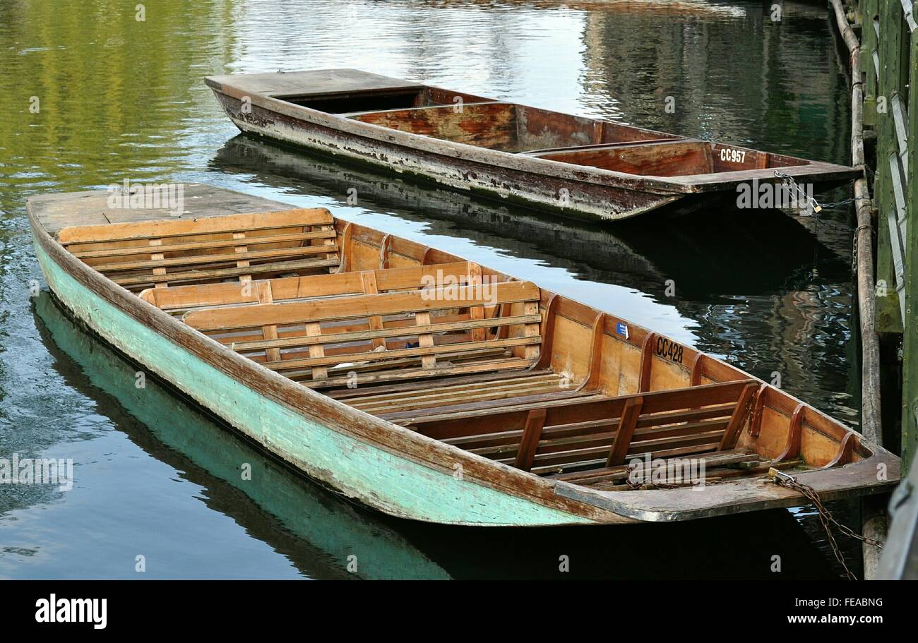 Rowboats Moored In River Stock Photo - Alamy