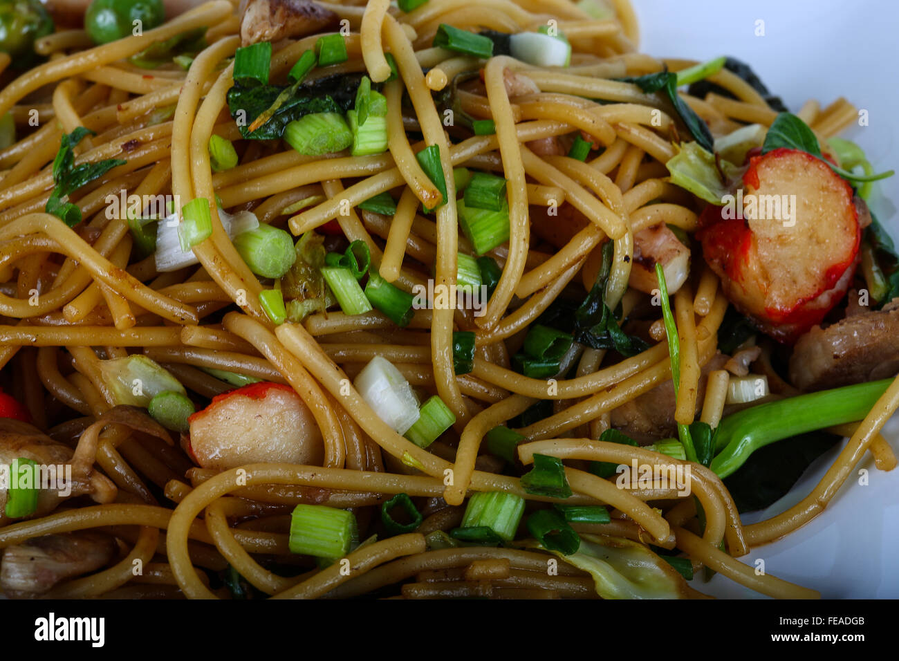 Asian style pasta with seafood on banana leaf Stock Photo - Alamy